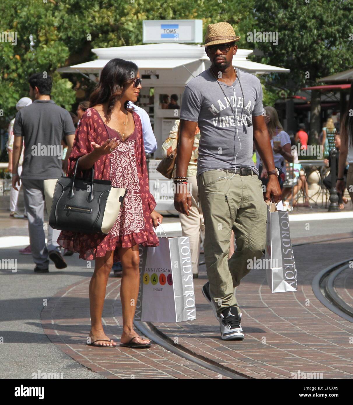 Bill Bellamy goes shopping with his wife Kristen at The Grove in ...