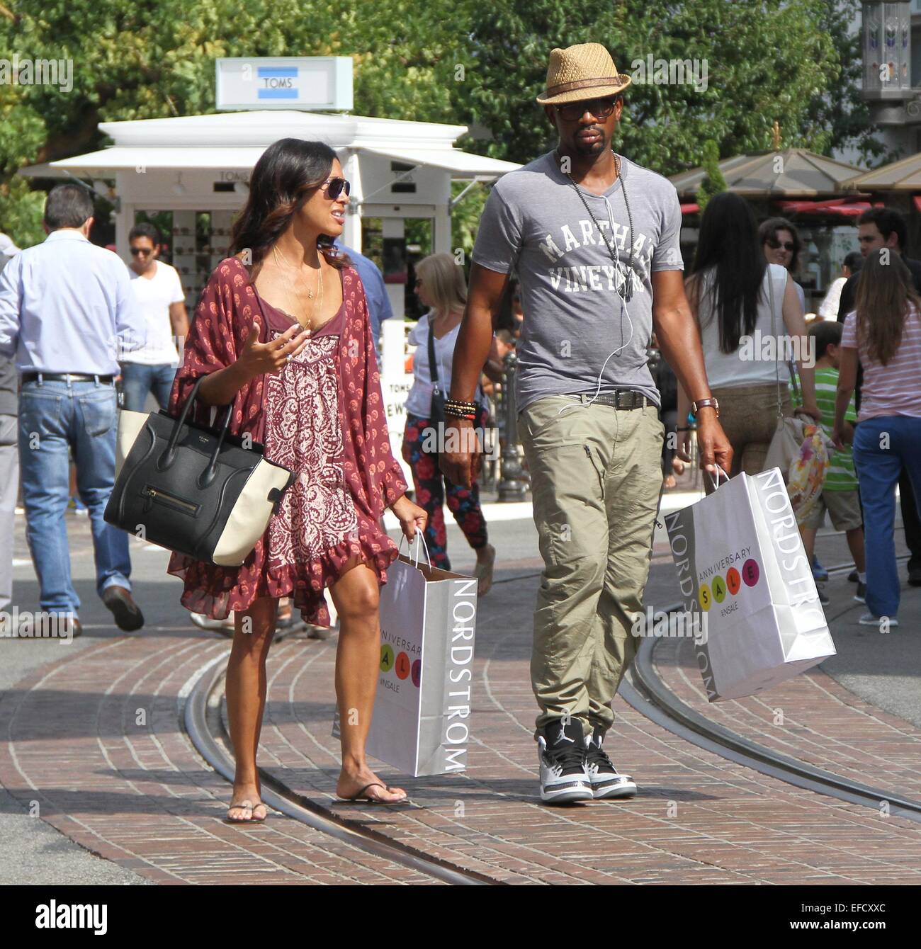 Bill Bellamy goes shopping with his wife Kristen at The Grove in ...