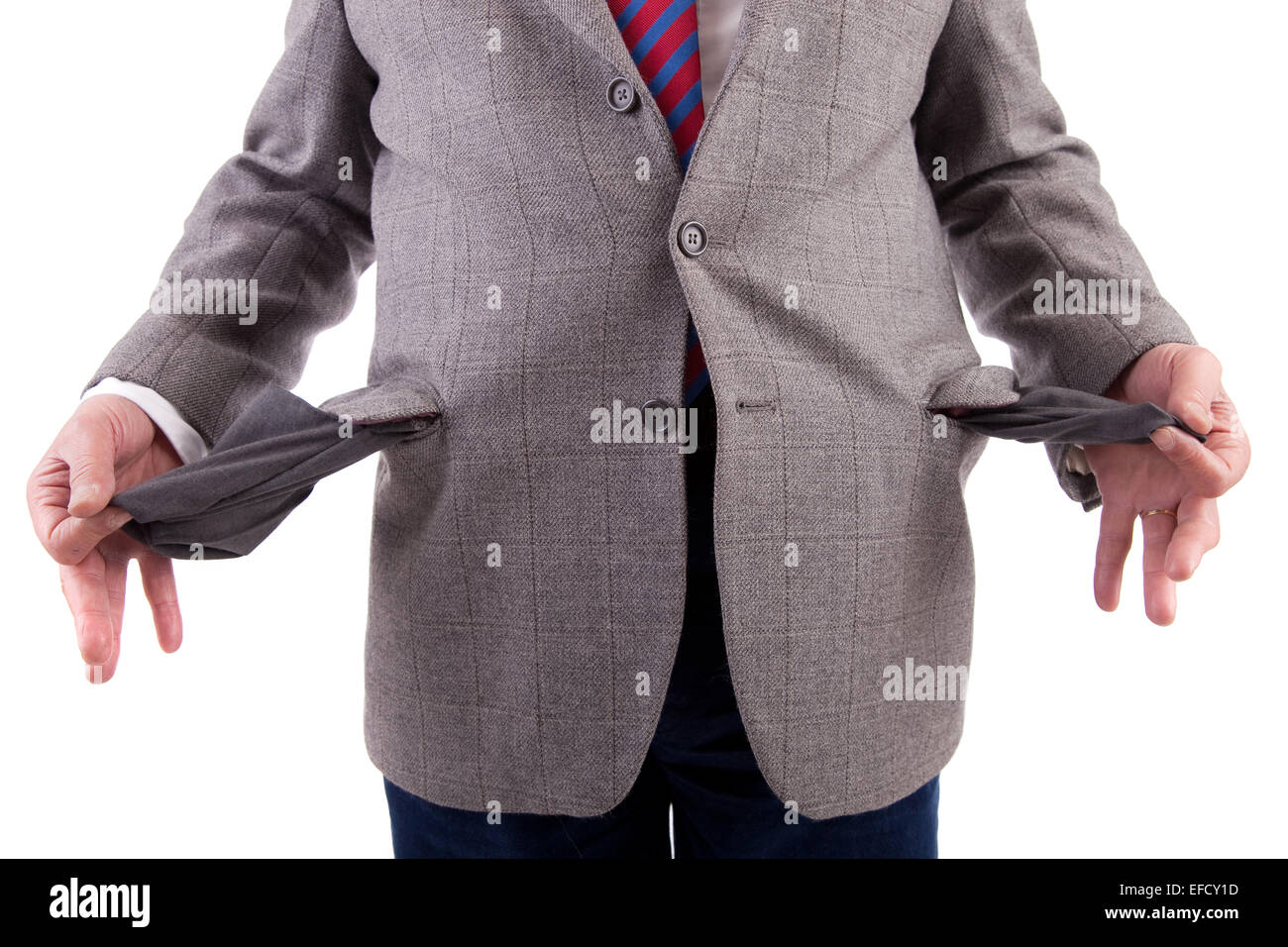 Man with empty pockets, isolated over white background Stock Photo - Alamy