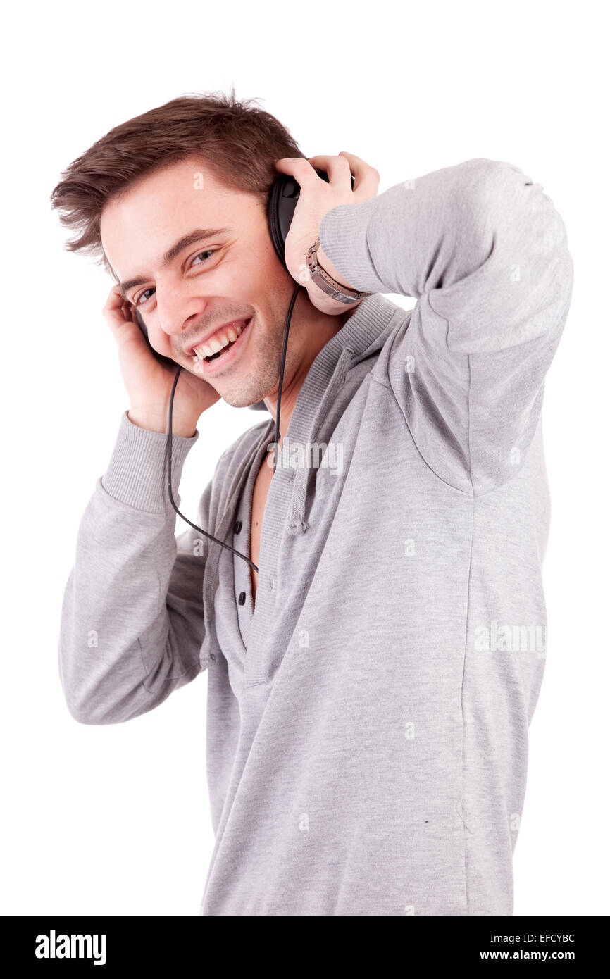Young man listening to music - isolated Stock Photo - Alamy