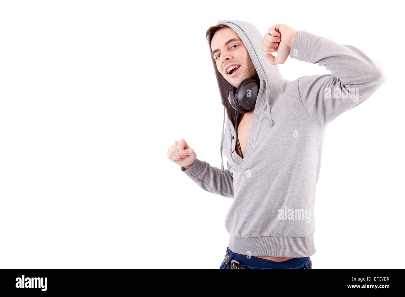 Young man listening to music - isolated Stock Photo - Alamy