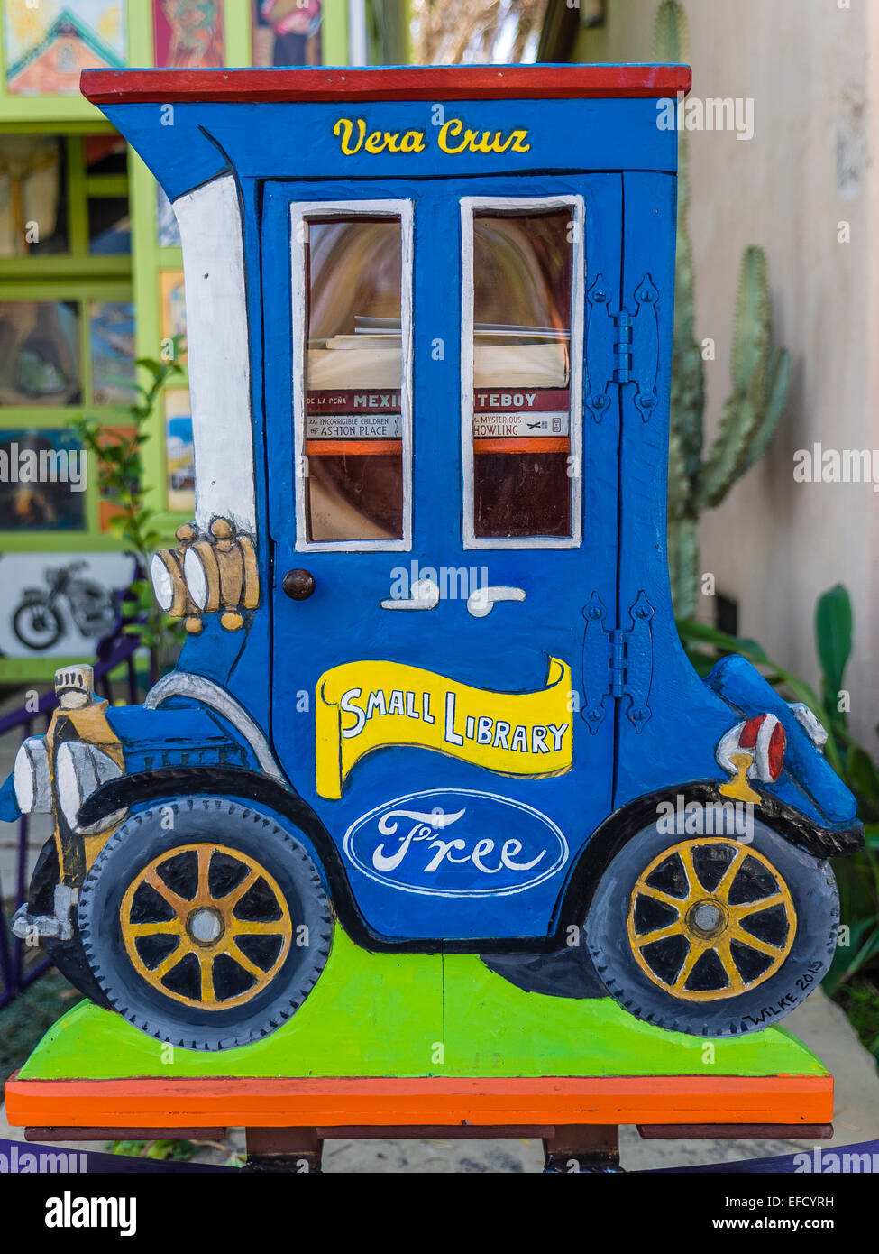 A Little Free Library constructed in the shape of an old fashioned car ...