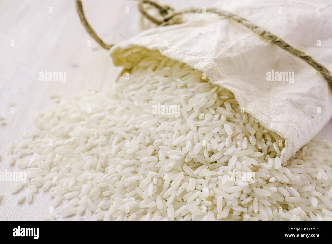Long grain rice in bulk sack Stock Photo - Alamy