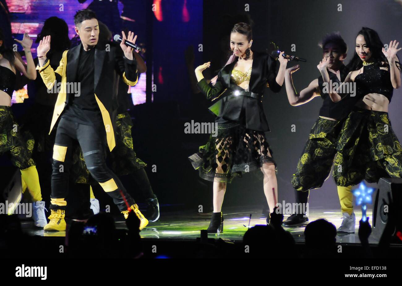 Taipei. 1st Feb, 2015. Singer Wilber Pan (1st L) performs with singer ...