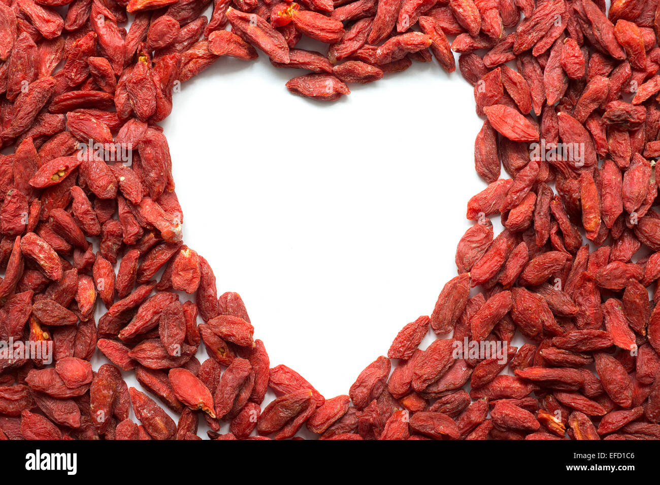 blank white heart figure inside of dried Goji berries Stock Photo - Alamy