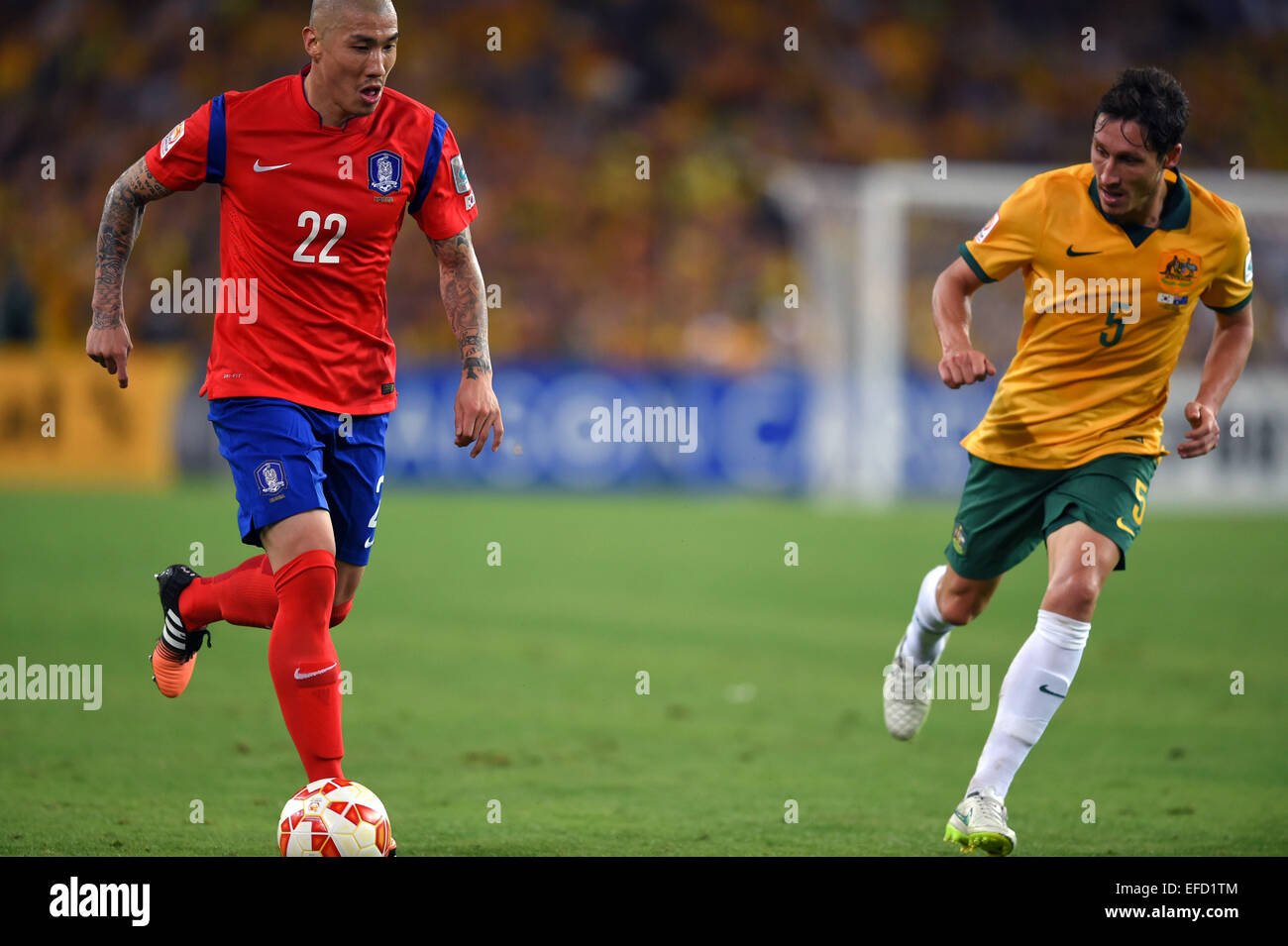 Sydney, Australia. 31st Jan, 2015. Cha Du Ri (KOR), Mark Milligan (AUS ...