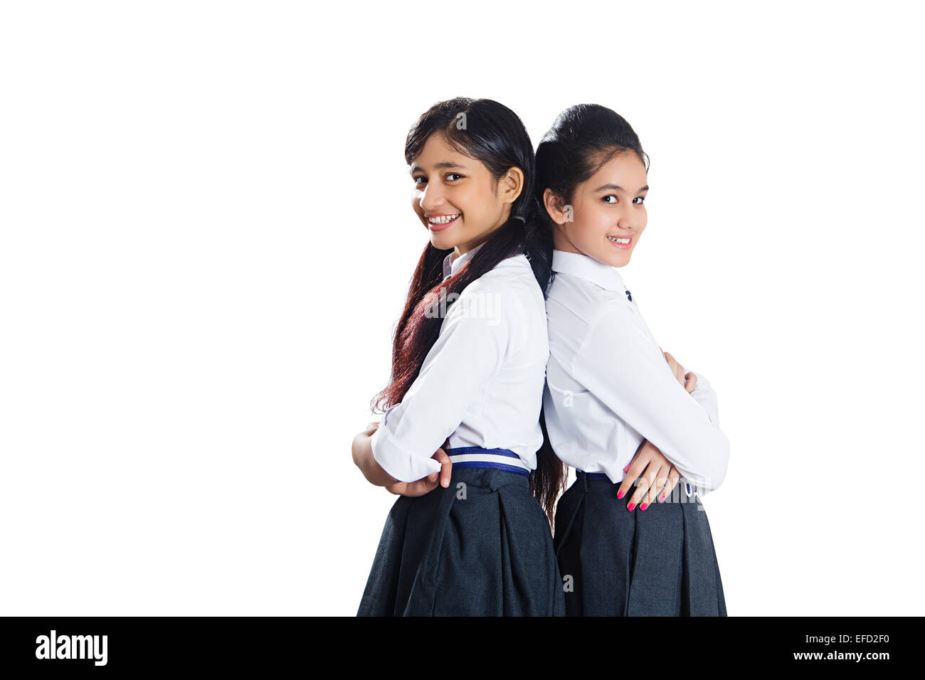 2 indian school girls students standing pose Stock Photo - Alamy