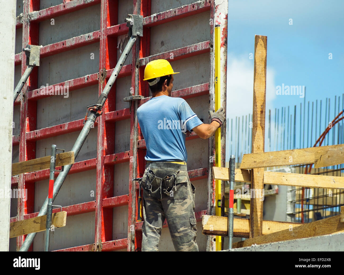 Man is working at the construction site Stock Photo - Alamy