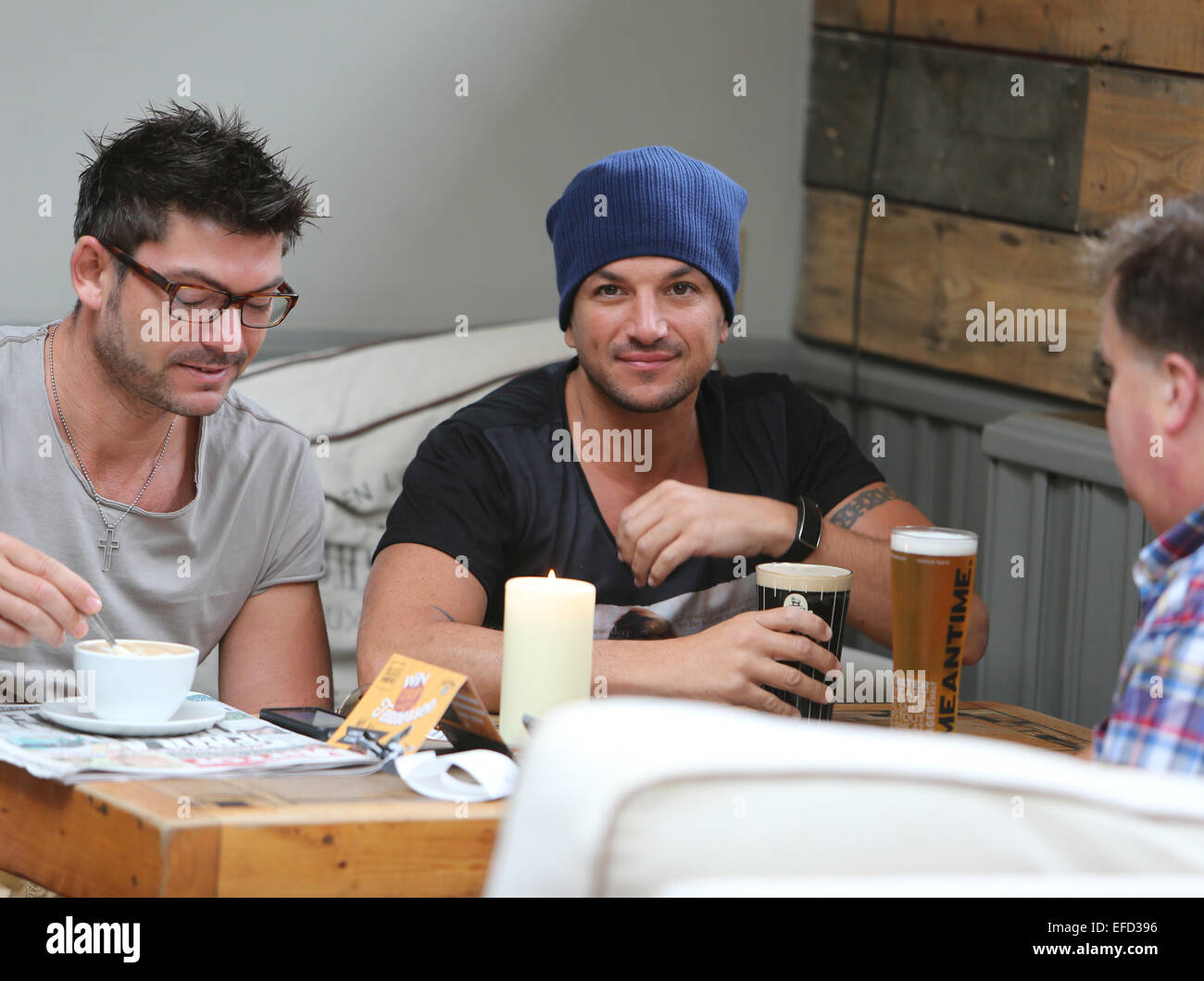 Peter Andre enjoys a drink with friends in a pub opposite the ITV ...