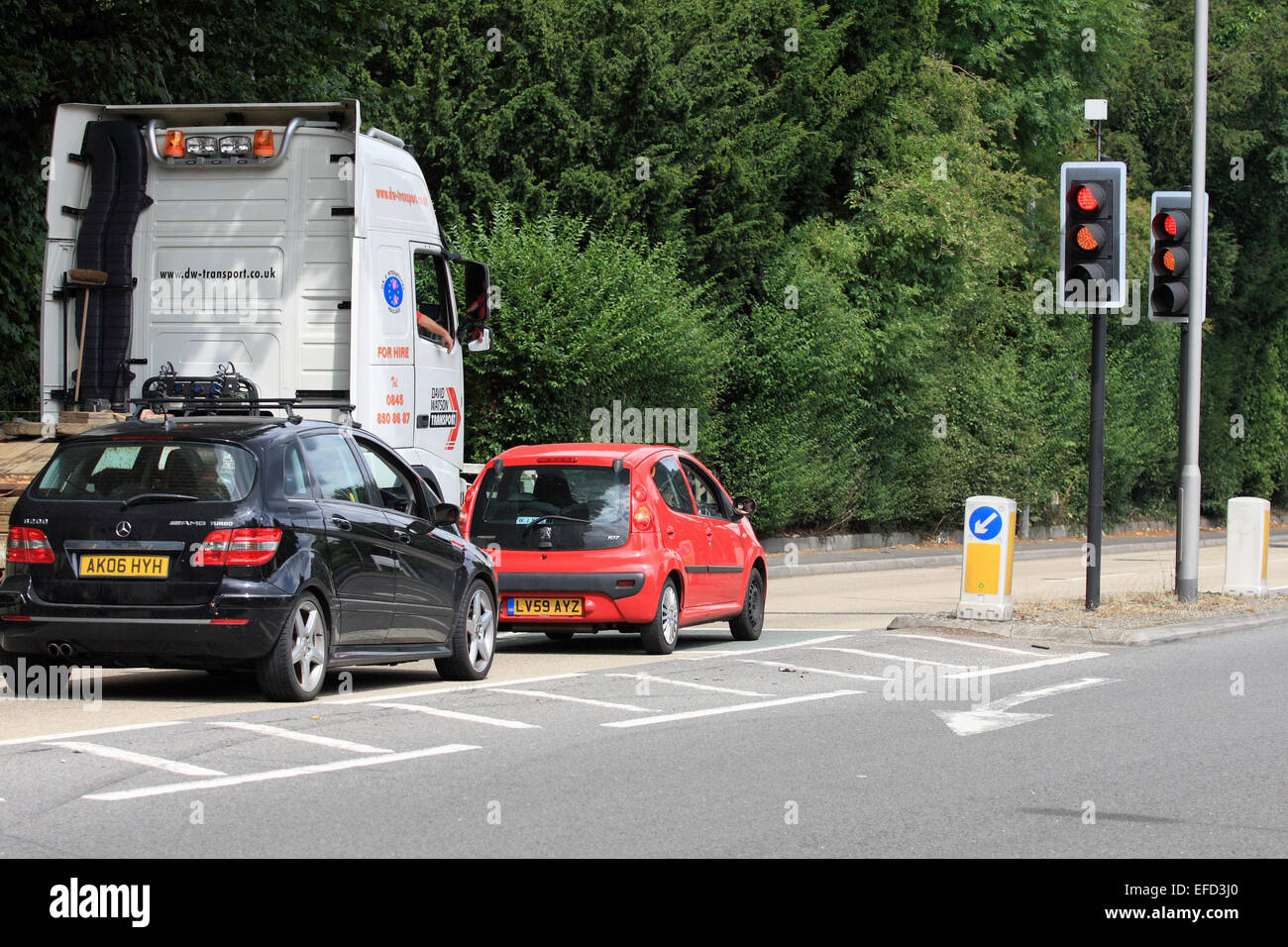 Traffic at red traffic lights on the A23 road in Coulsdon, Surrey ...