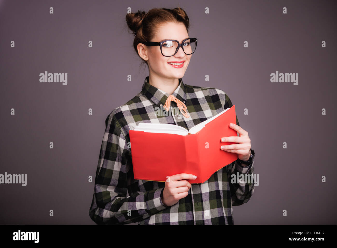 Girl with book Stock Photo - Alamy