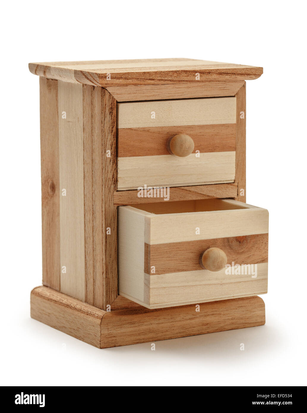 Wooden chest drawer toy on white background Stock Photo - Alamy