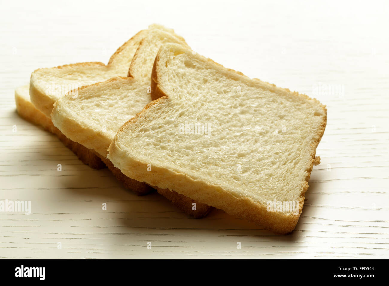 Sliced toast bread on a surface of a table Stock Photo - Alamy