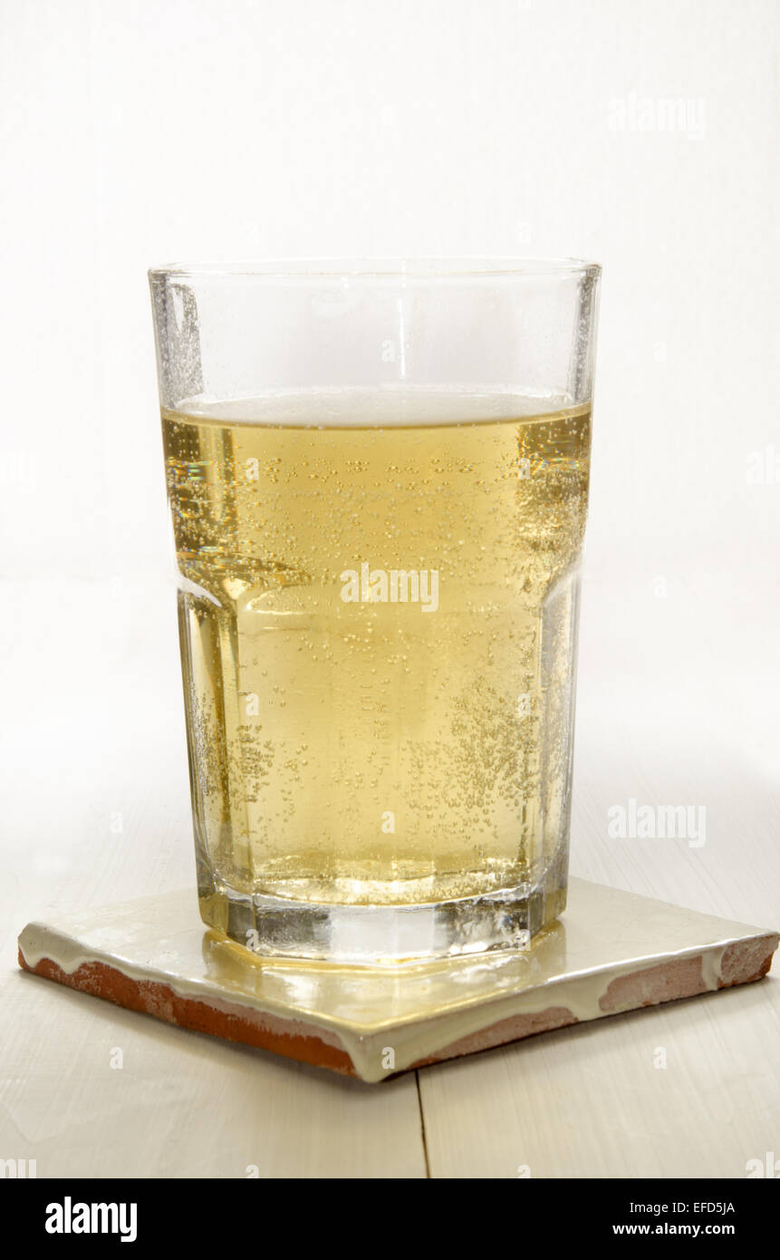 sparkling cold apple juice in a glass Stock Photo - Alamy