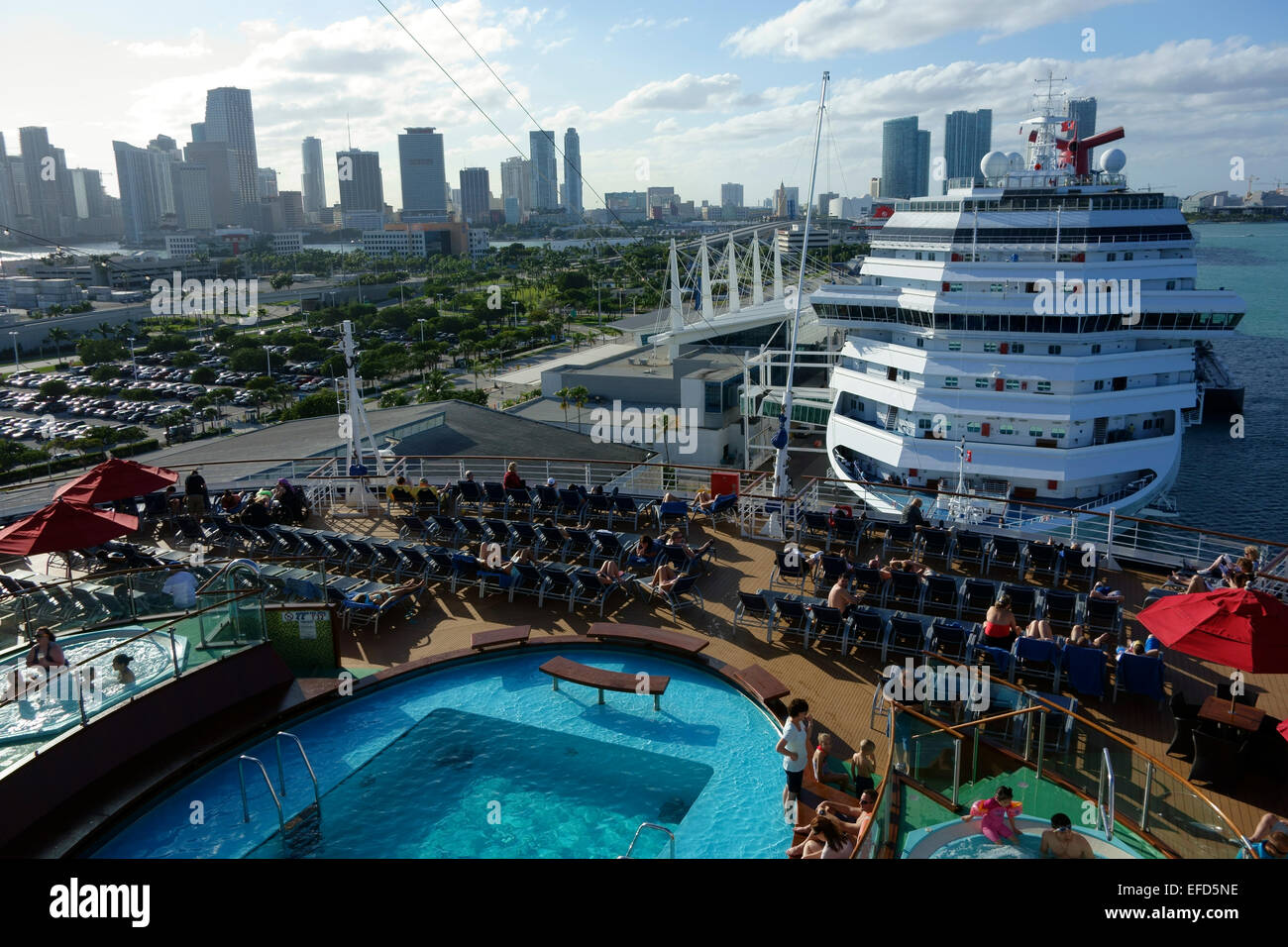 Aerial view of the cruise ships in the port of Miami and skyscrapers of ...