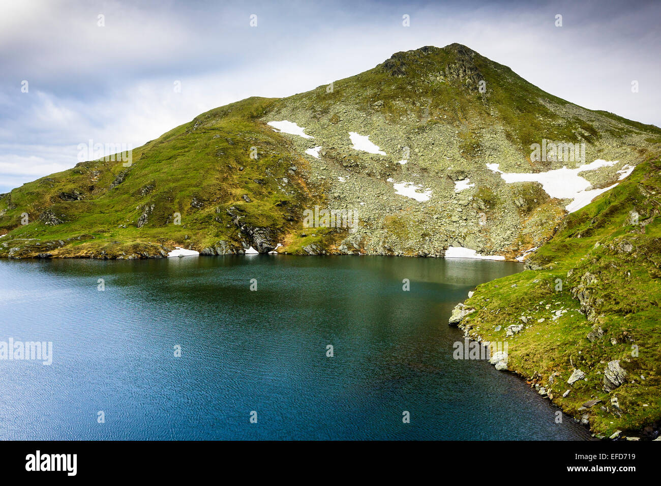 Landscape from Capra Lake and Fagaras mountains in Romania Stock Photo ...