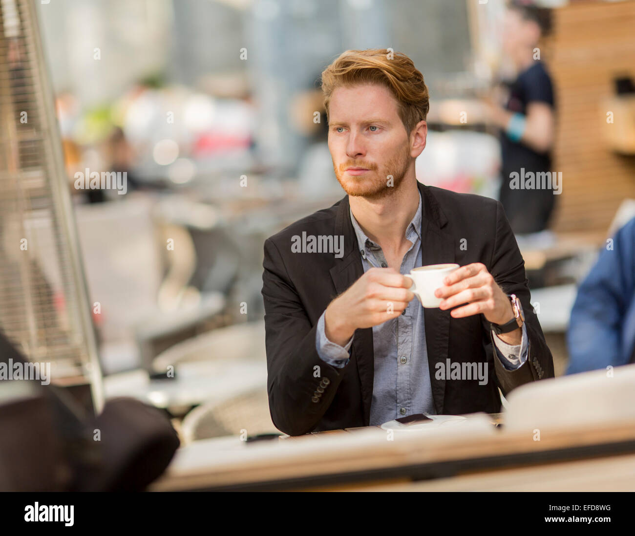 Attractive handsome man in cafe hi-res stock photography and images - Alamy