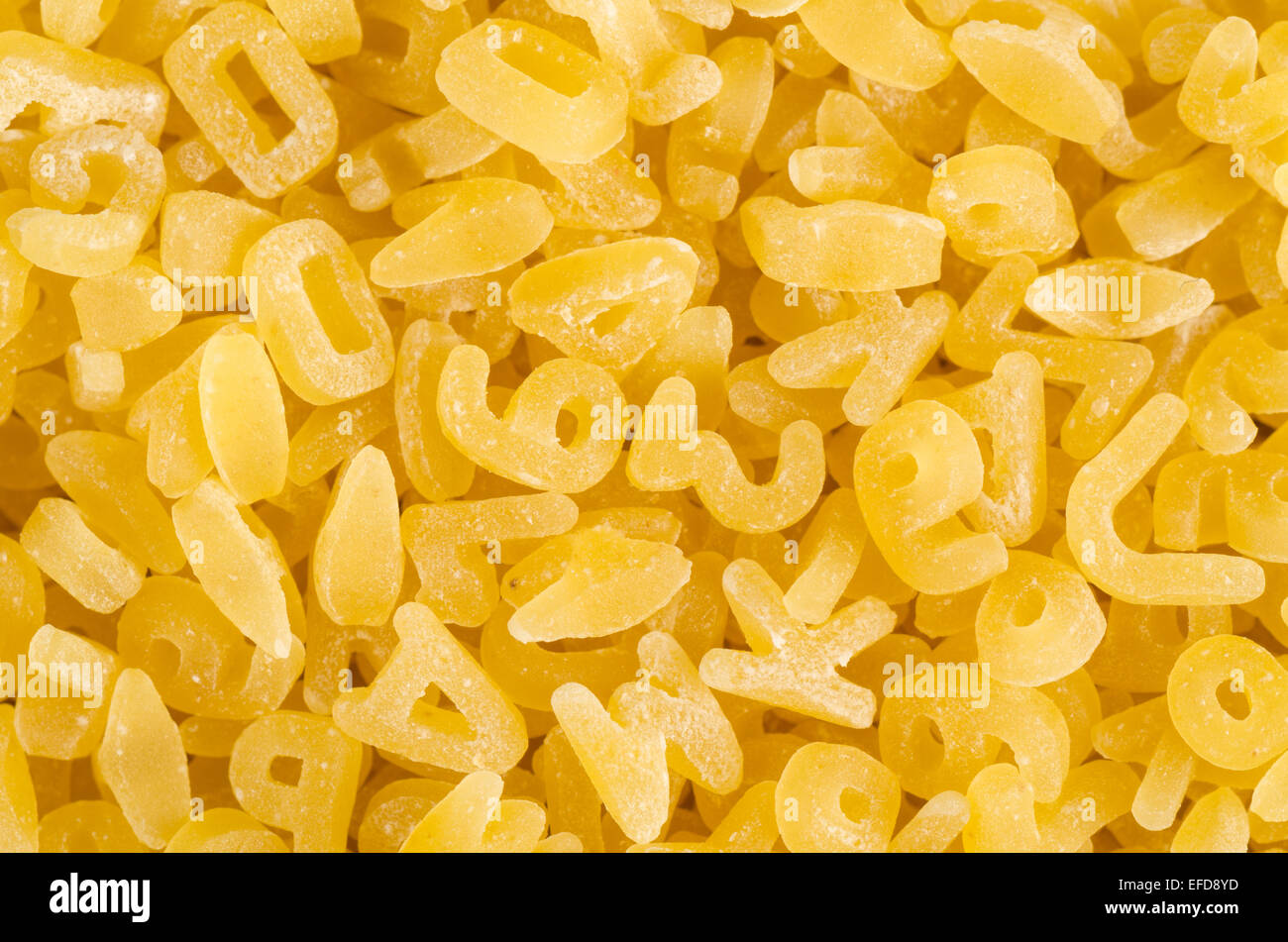 Full frame take of a heap of pasta letters Stock Photo - Alamy