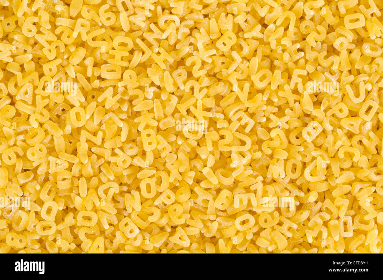 Full frame take of a heap of pasta letters Stock Photo - Alamy