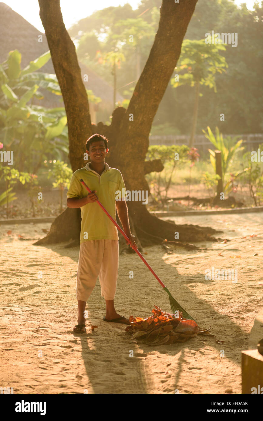 Man Raking Leaves