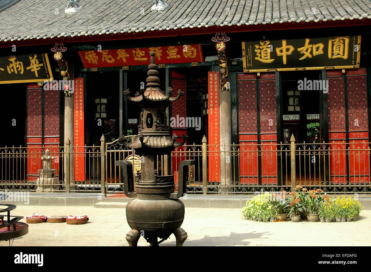 Chengdu, China: An ornamental cast-iron paper brazier stands in a ...