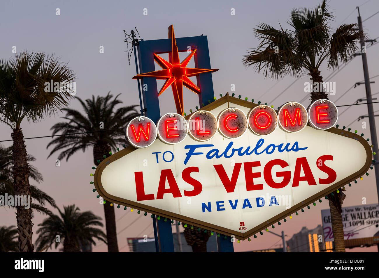 Famous neon Welcome to Fabulous Las Vegas sign surrounded by palm trees ...