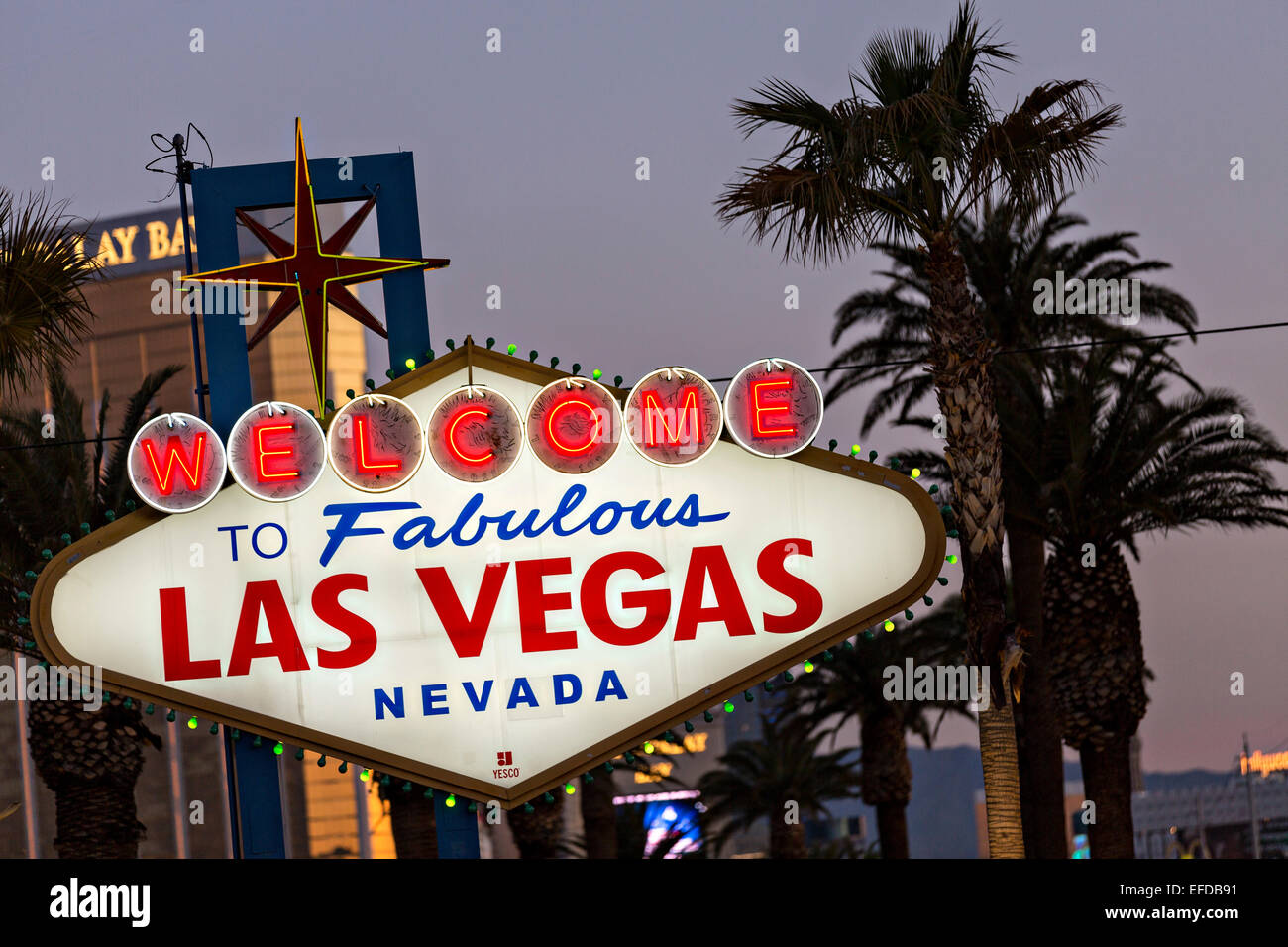 Famous neon Welcome to Fabulous Las Vegas sign surrounded by palm trees ...