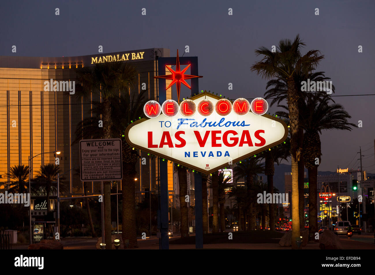 Famous neon Welcome to Fabulous Las Vegas sign surrounded by palm trees ...