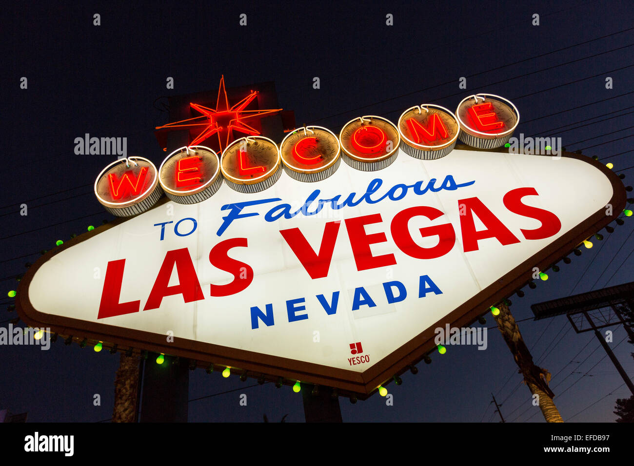 Famous neon Welcome to Fabulous Las Vegas sign surrounded by palm trees ...