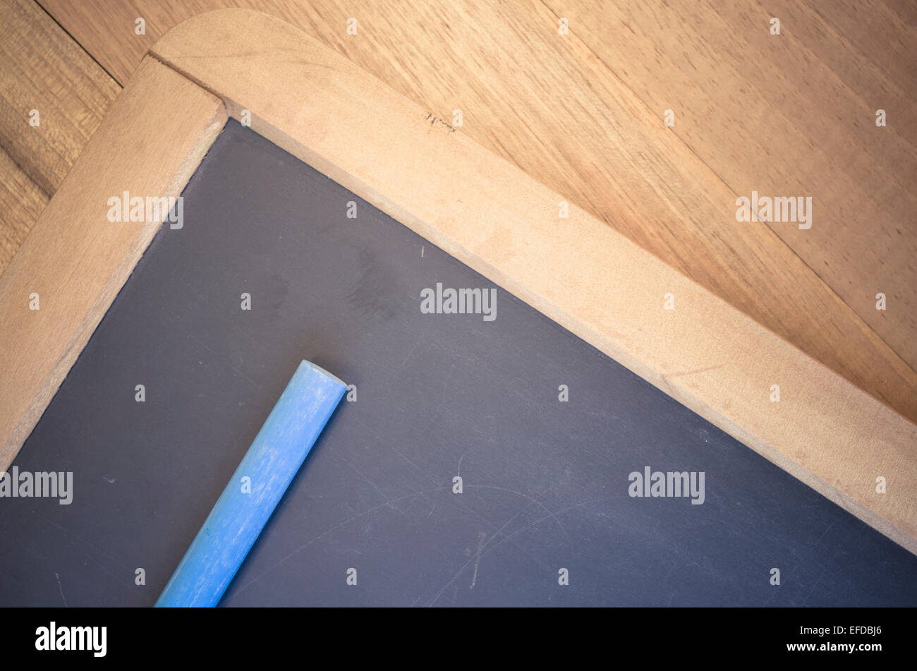 small blackboard with wood border and blue chalk Stock Photo - Alamy