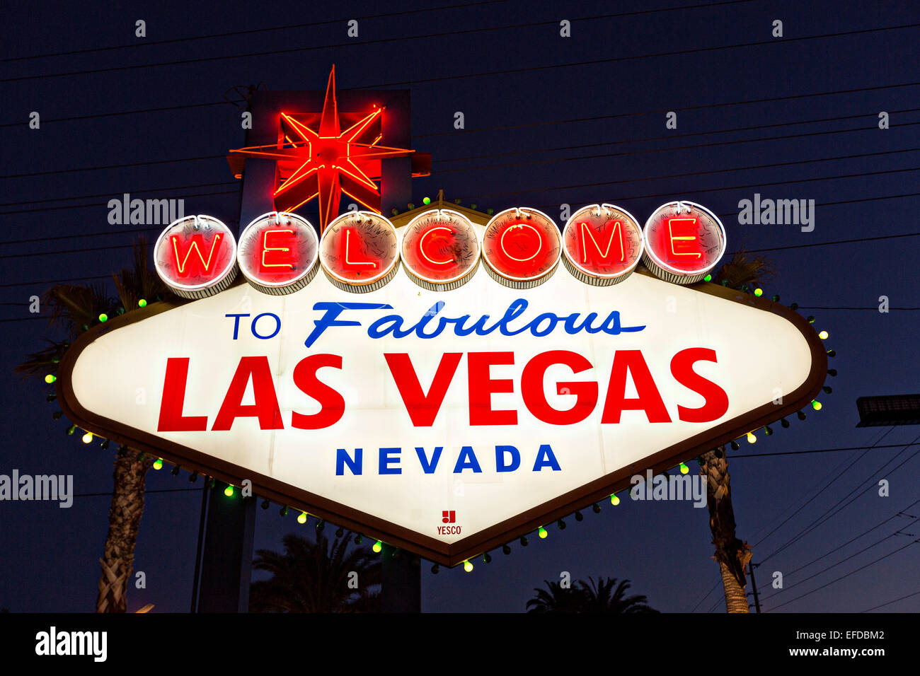 Famous neon Welcome to Fabulous Las Vegas sign surrounded by palm trees ...