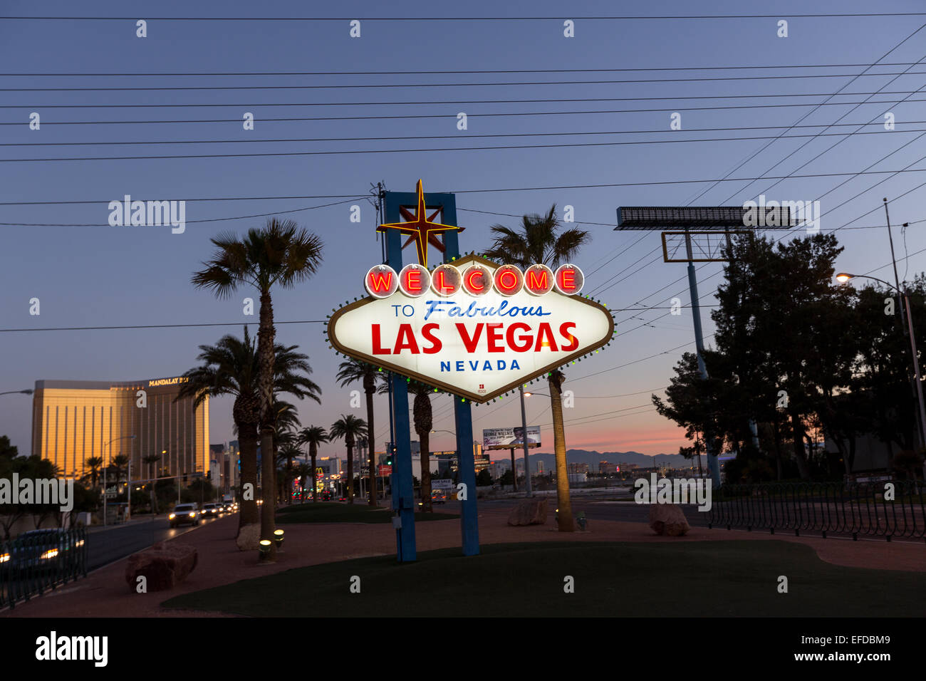 Famous neon Welcome to Fabulous Las Vegas sign surrounded by palm trees ...