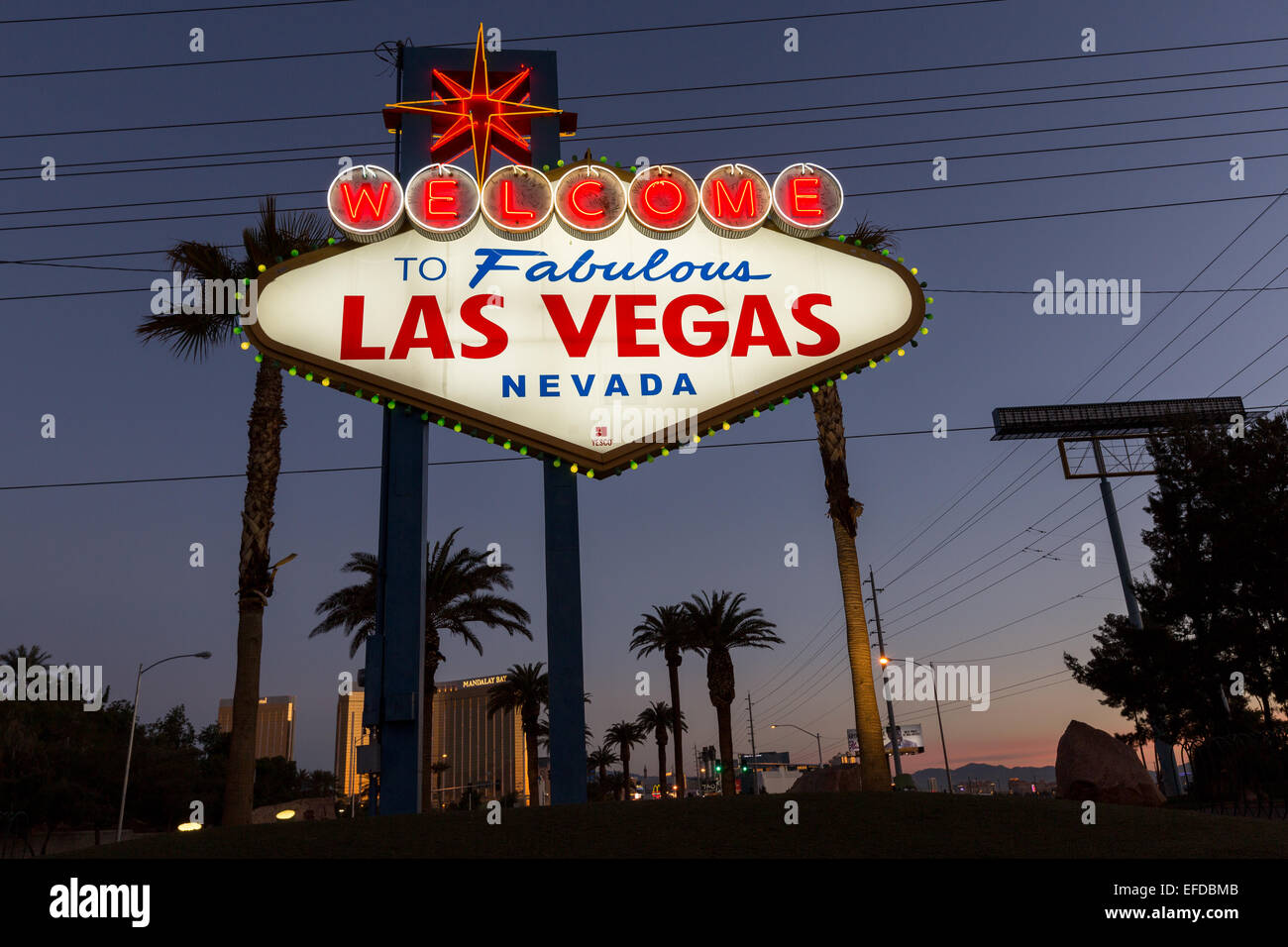 Famous neon Welcome to Fabulous Las Vegas sign surrounded by palm trees ...