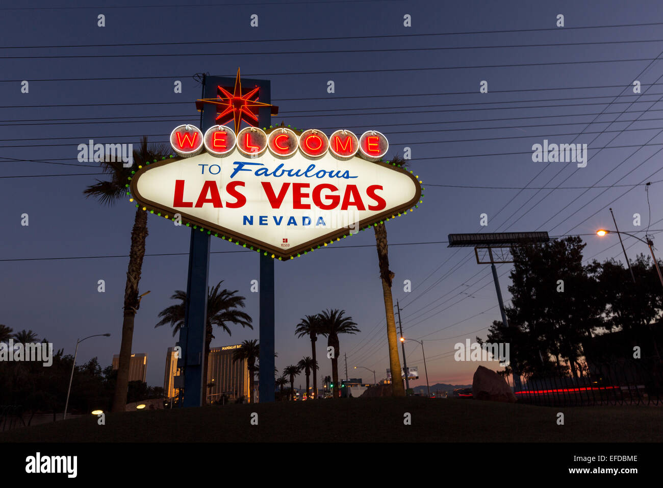 Famous neon Welcome to Fabulous Las Vegas sign surrounded by palm trees ...