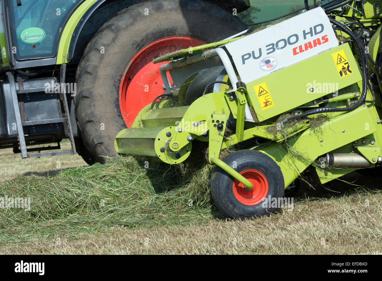 Close Up Of The Pick Up Head Of A Claas Self Propelled Harvester Making close-up-of-the-pick-up-head-of-a-claas-self-propelled-harvester-making