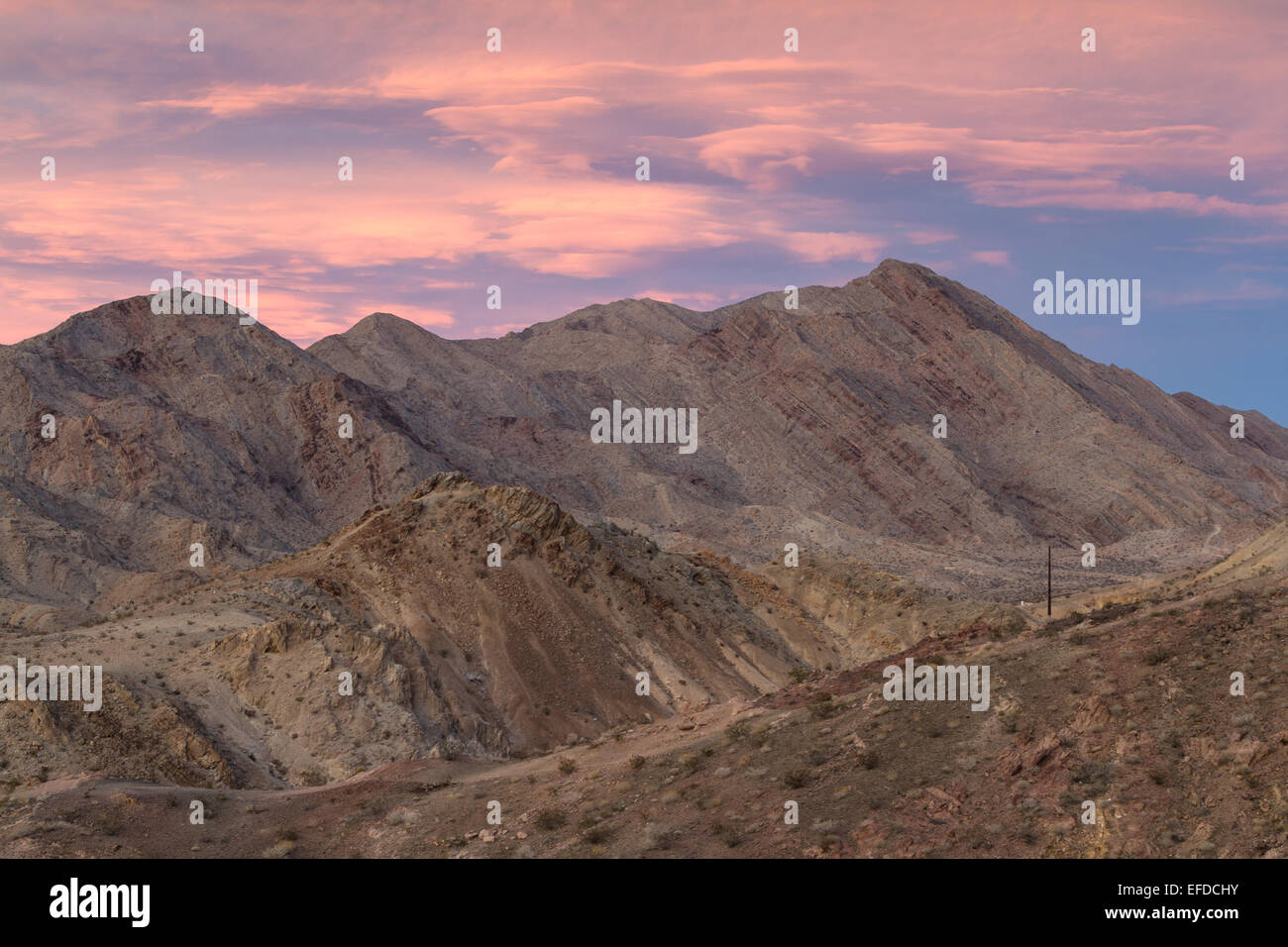 beautiful sunset over the bare rock mountains in south western Nevada ...