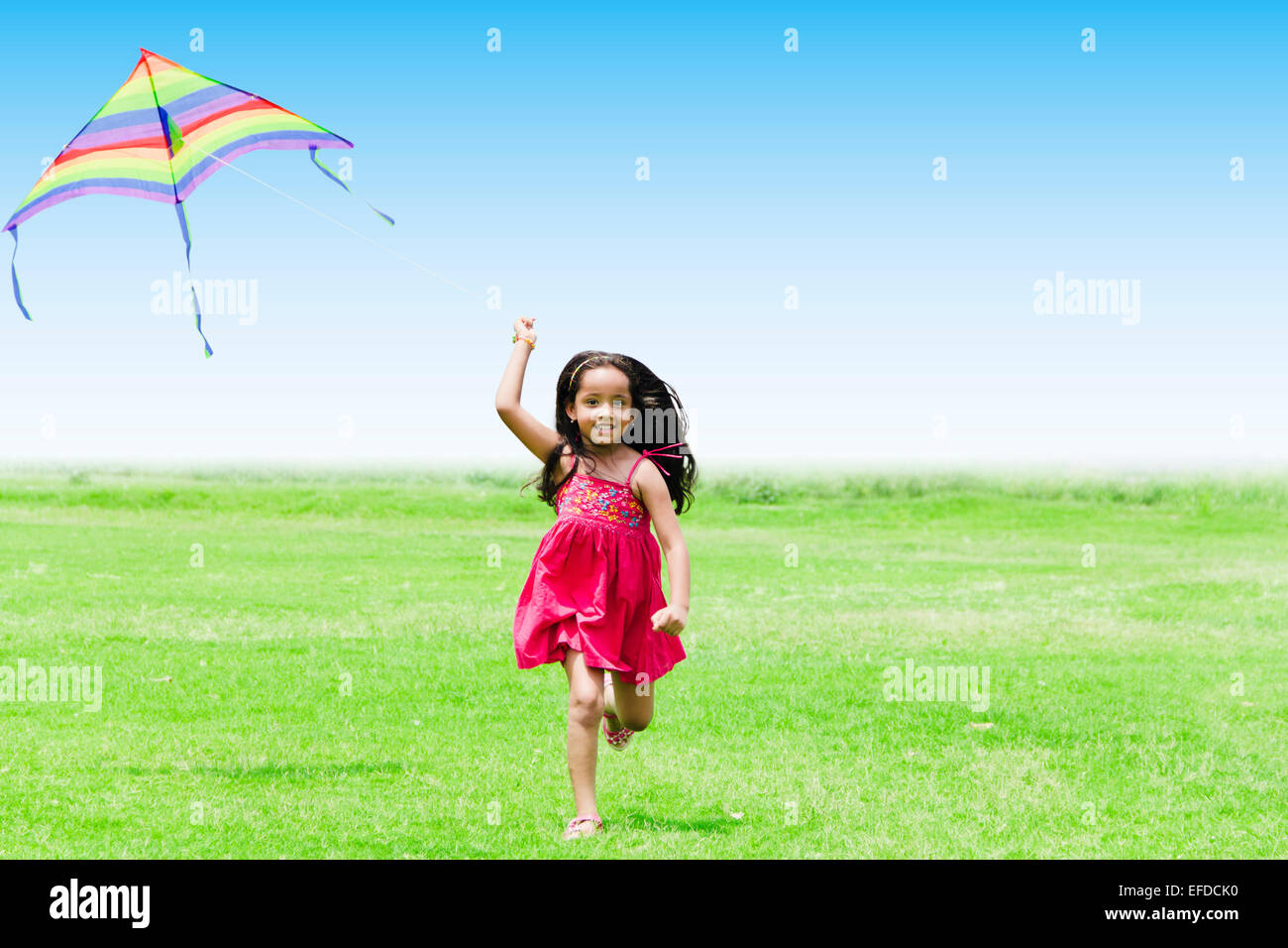 Girl playing kite outside hi-res stock photography and images - Alamy