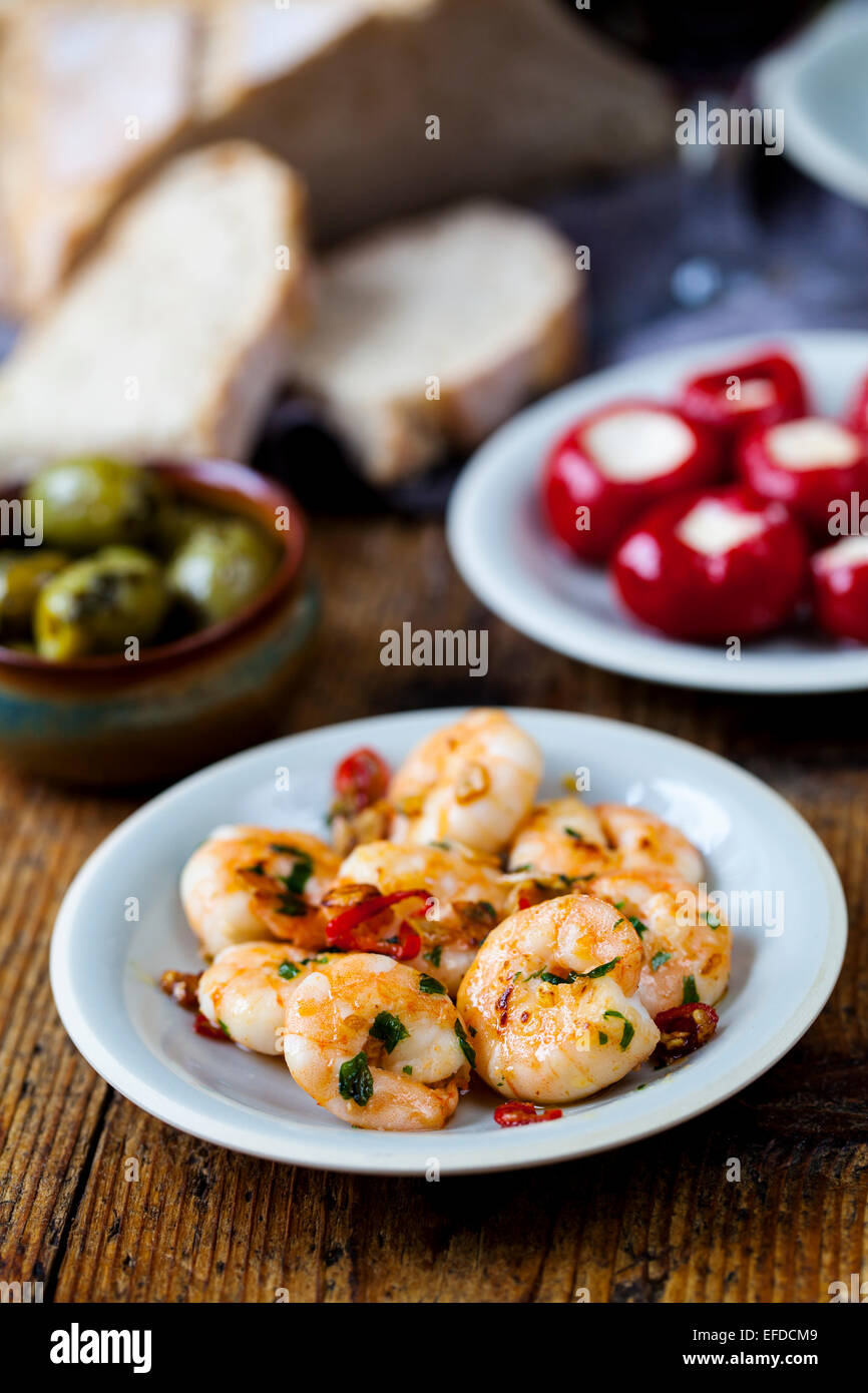Small plate of spicy prawns Stock Photo - Alamy