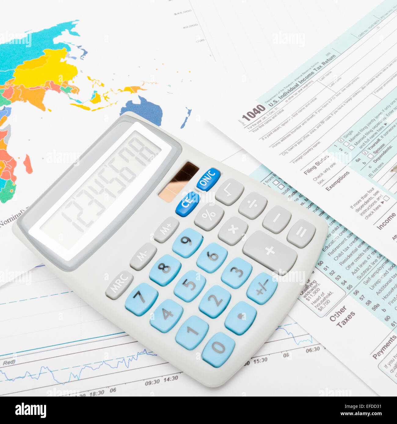 Filling out 1040 US Tax Form - studio shot Stock Photo - Alamy