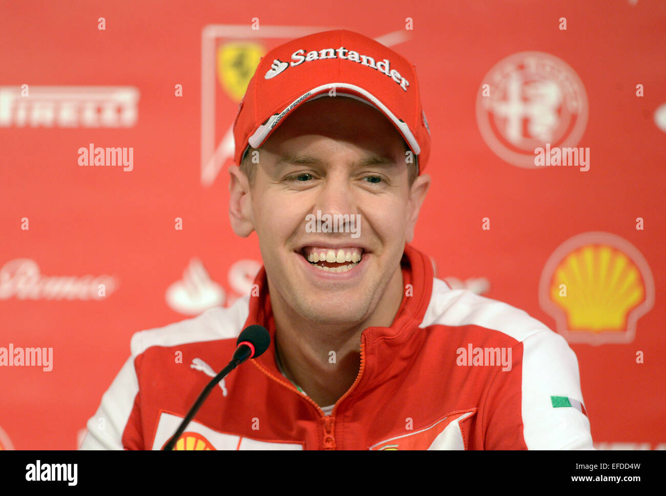 German Formula One driver Sebastian Vettel of Scuderia Ferrari talks to ...