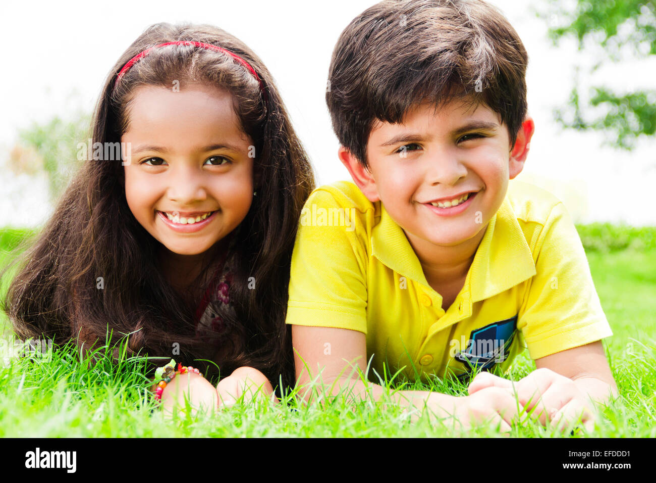 2 indian children friend park enjoy Stock Photo - Alamy