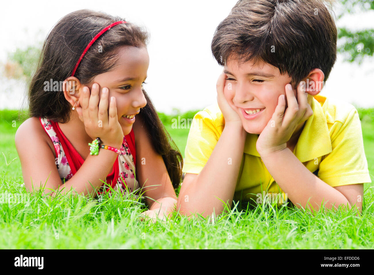 2 indian children friend park enjoy Stock Photo - Alamy
