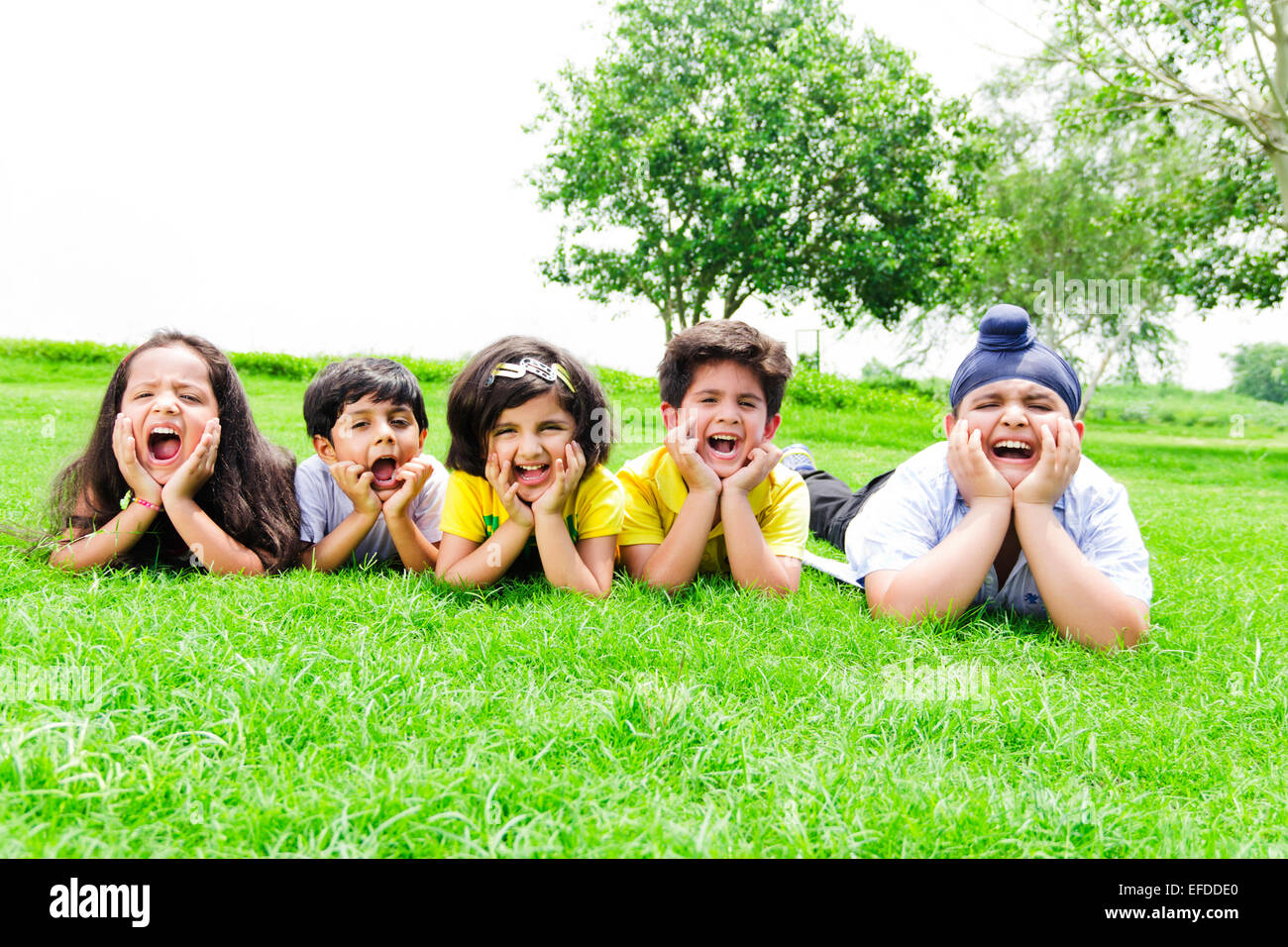 indian children group crowds friends park fun Stock Photo - Alamy
