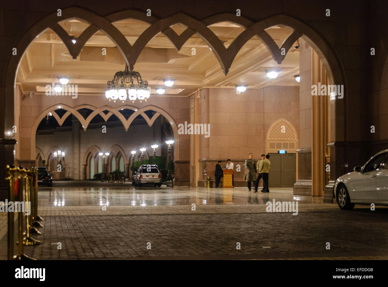 Front entrance to the Emirates Palace, Abu Dhabi, at night with ...