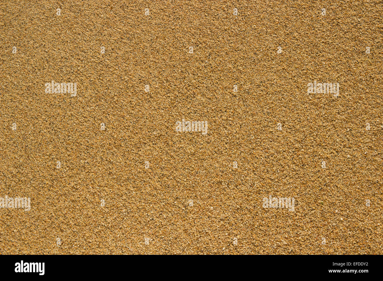 gold sand texture, gold sandy background Stock Photo - Alamy