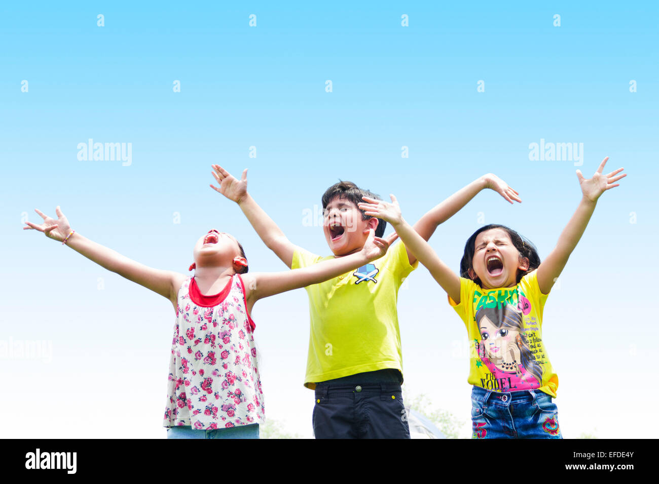 3 indian children friends Park Mischief Stock Photo - Alamy