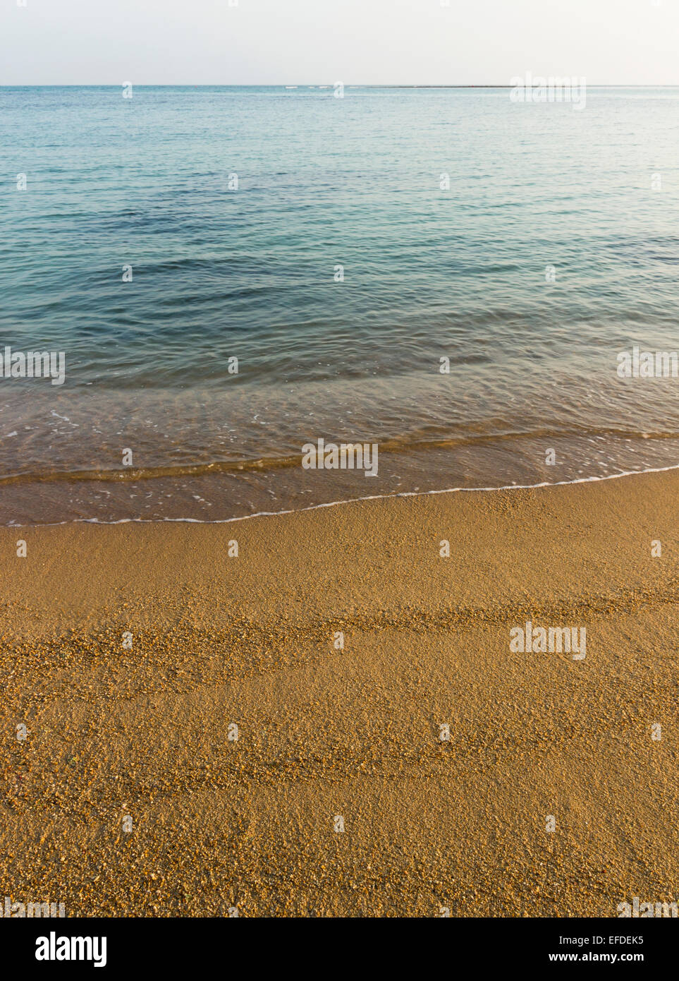 tranquil beautiful sand beach. calm water background Stock Photo - Alamy