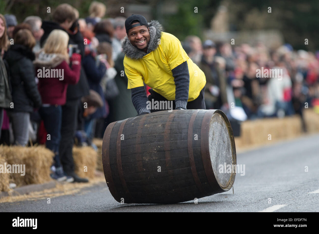 Competitors trying to control their barrel in the annual Boxing Day ...