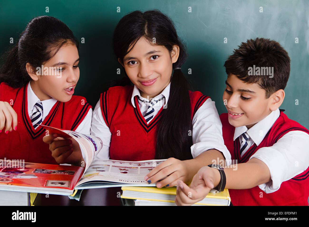 3 indian school friends students book Study Stock Photo - Alamy