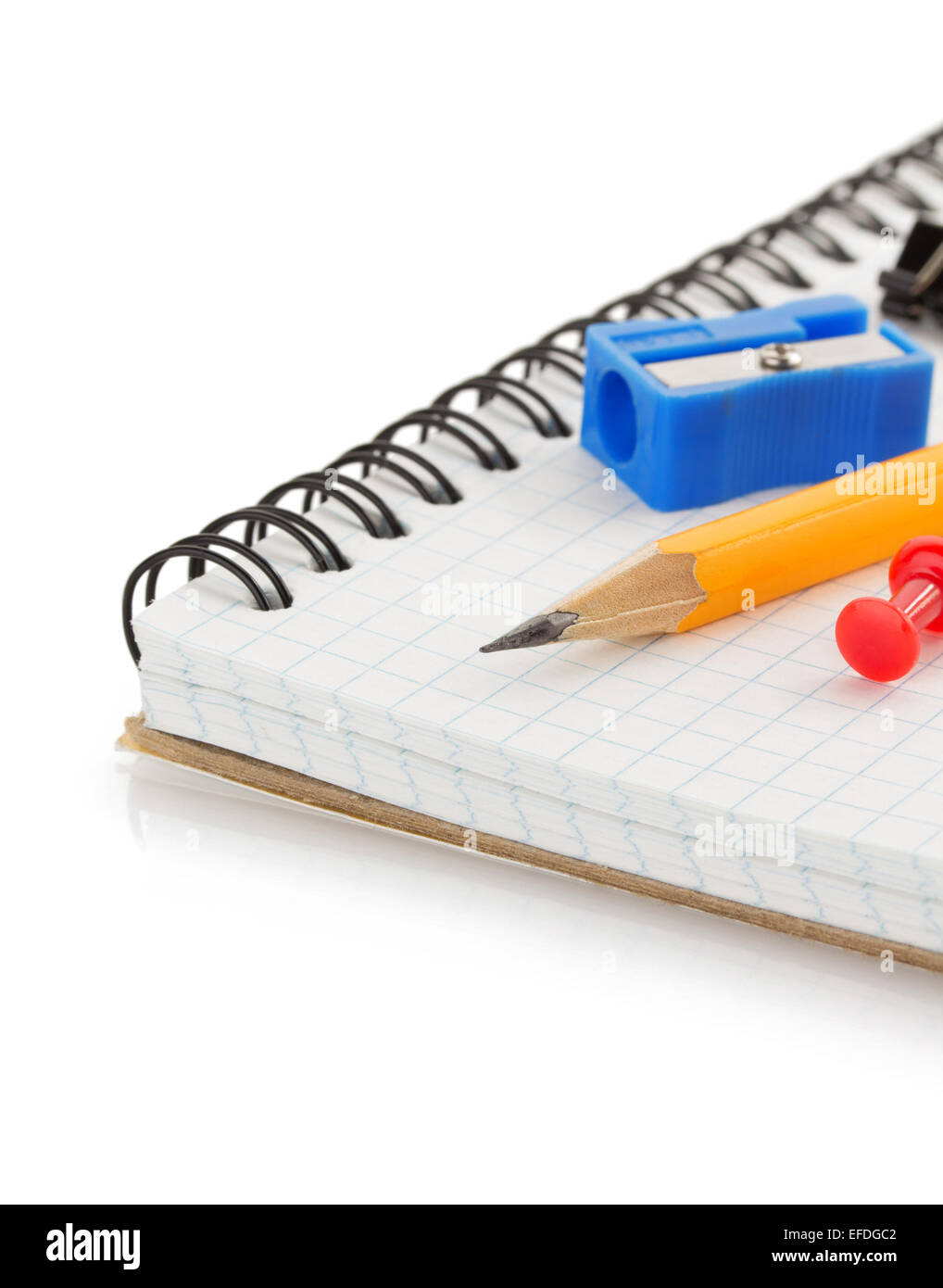 checked notebook isolated on white background Stock Photo - Alamy